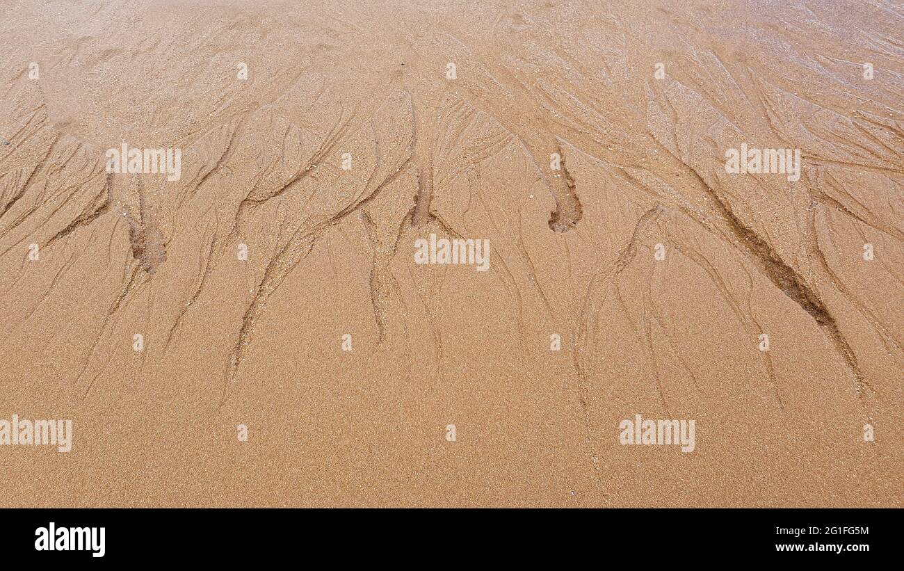Patterns in sand, shaped by sea Stock Photo - Alamy