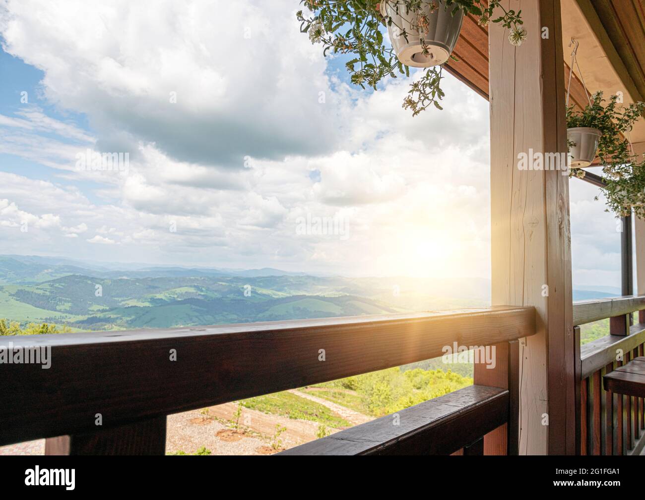 Wooden terrace with mountain views Stock Photo - Alamy