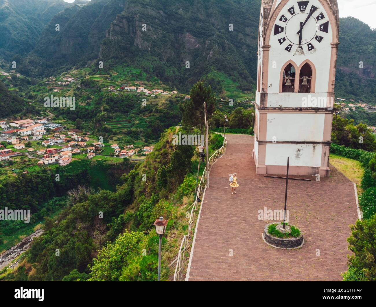 Aerial shot of old Clock Tower on a hill in Madeira, Portugal with Sao ...