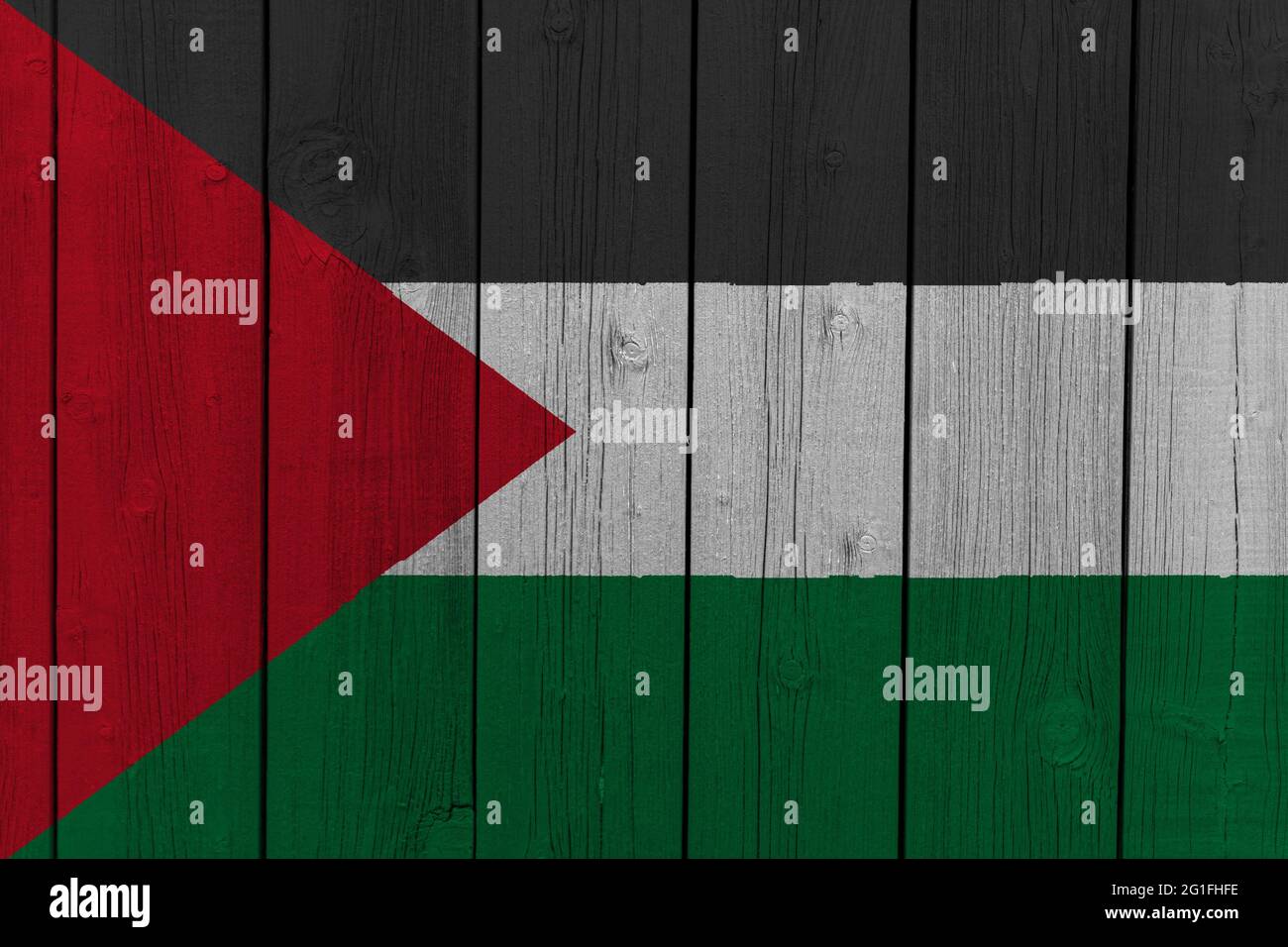 The National Flag of Palestinian Authorities painted on a wooden wall ...