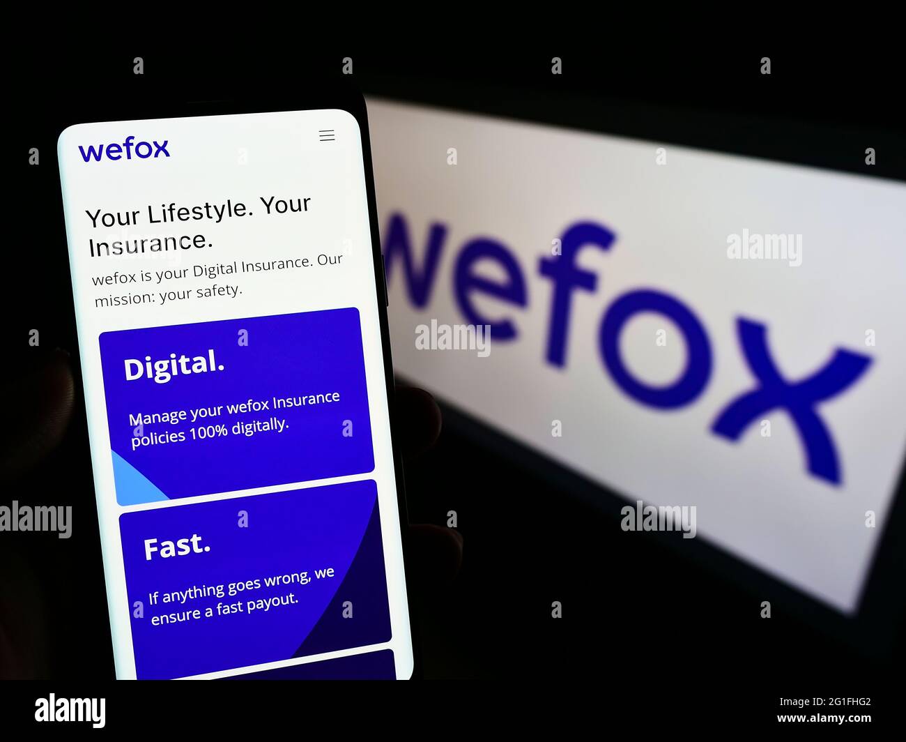 Wefox holding hi-res stock photography and images - Alamy