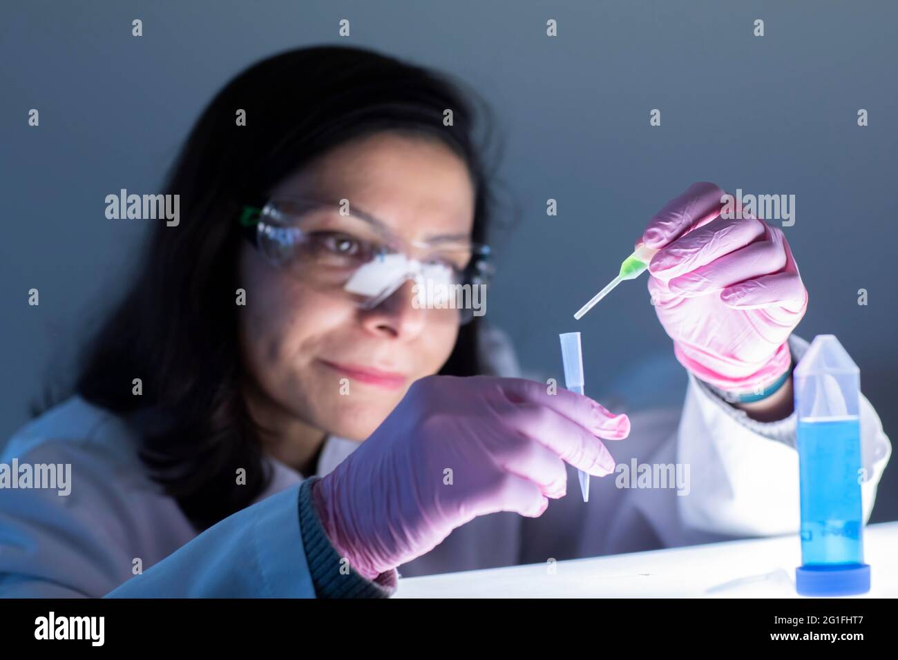 Middle aged technician in laboratory with lab coat, Freiburg, Baden ...