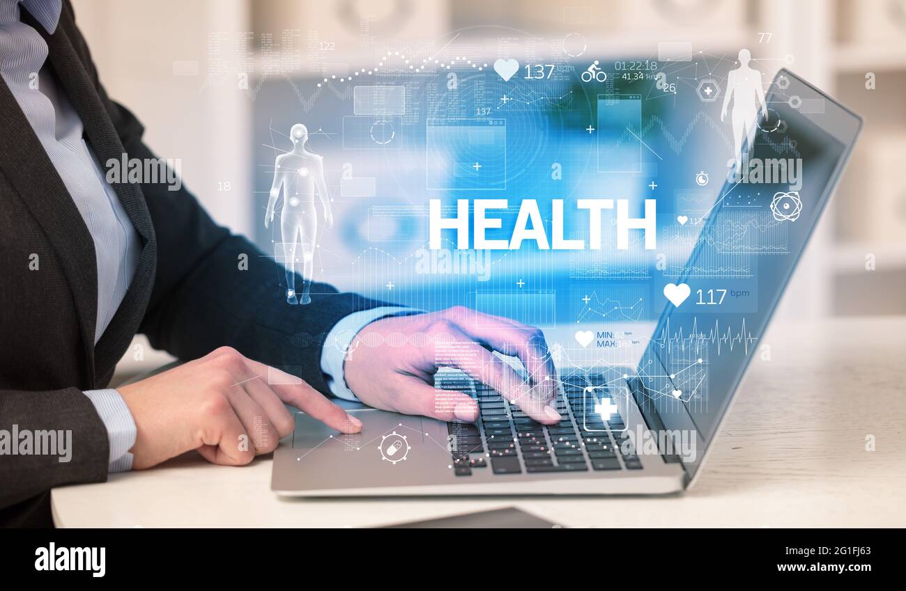 Doctor working a health check Stock Photo - Alamy