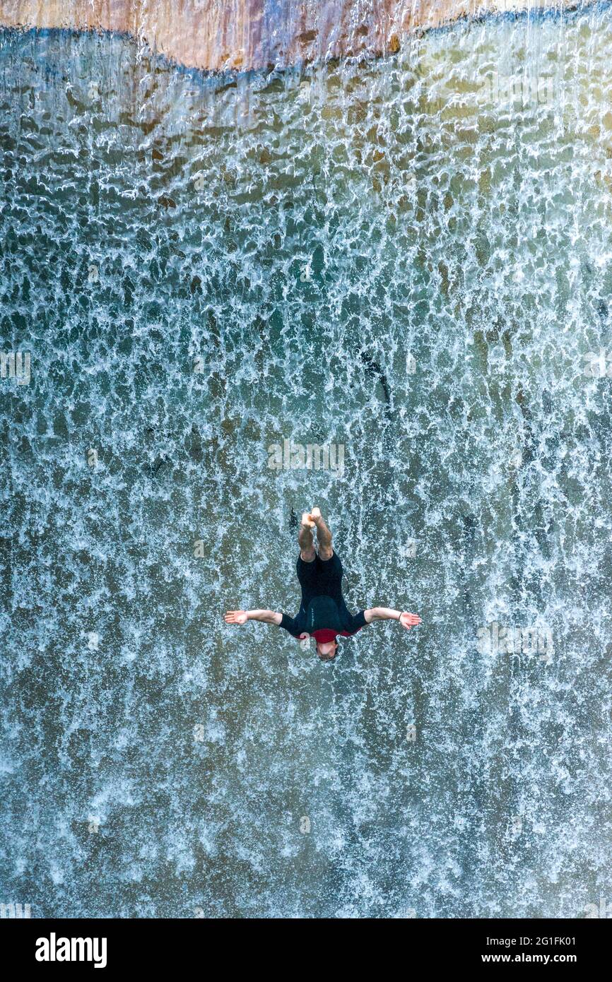 Person diving from the top of Victoria Waterfall in Canada's Wonderland ...