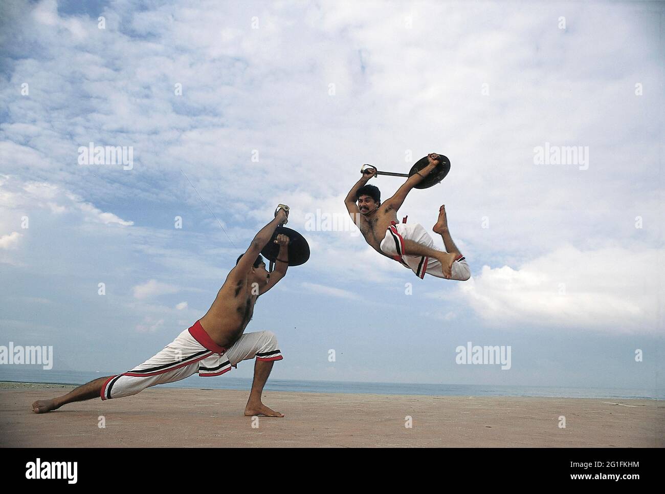Two men fighting, Kalarippayattu, Kerala, India Stock Photo - Alamy