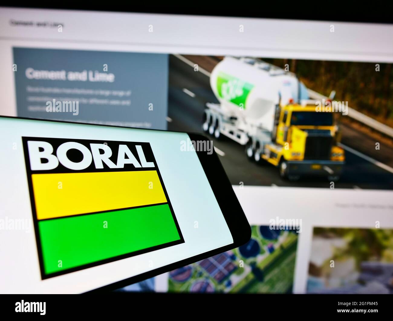 Cellphone with logo of Australian materials company Boral Limited on ...