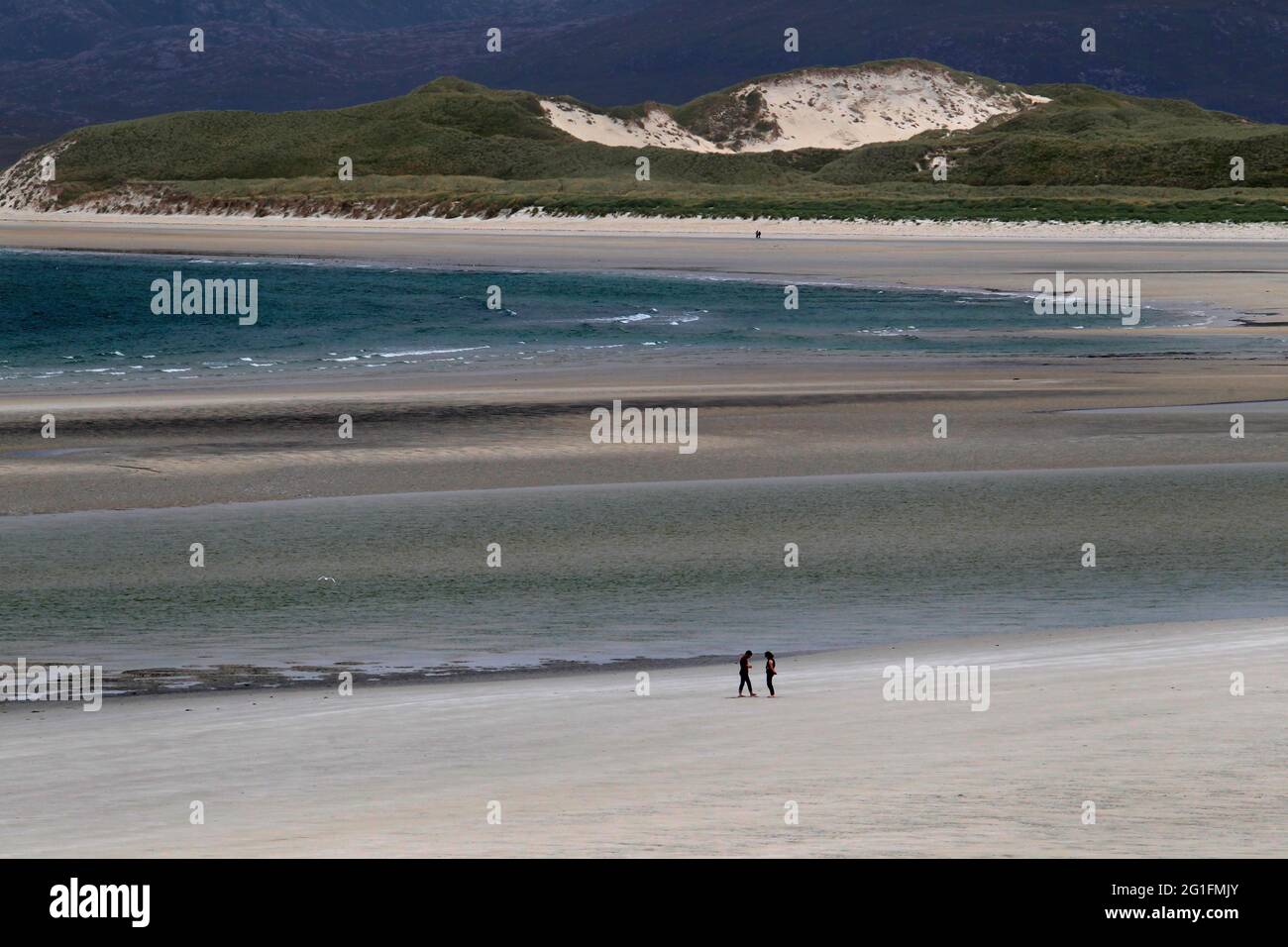 Luskentyre beach, sand dune, dune grass, white beach, two walkers ...