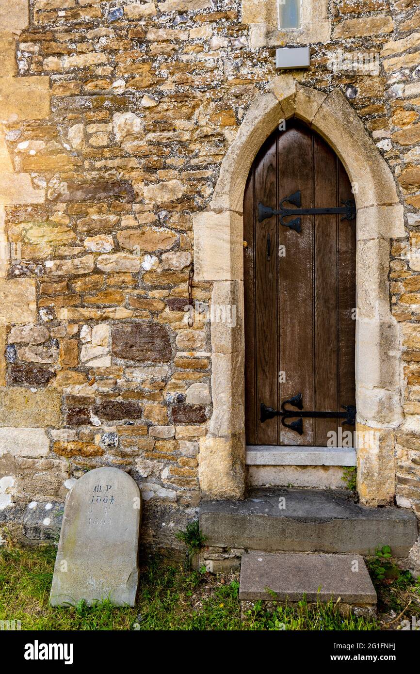 Church Vestry Door with unfinished headstone Stock Photo - Alamy