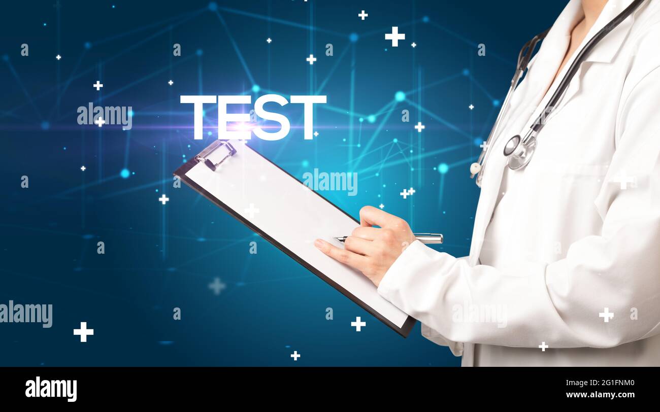 Doctor fills out medical record Stock Photo - Alamy