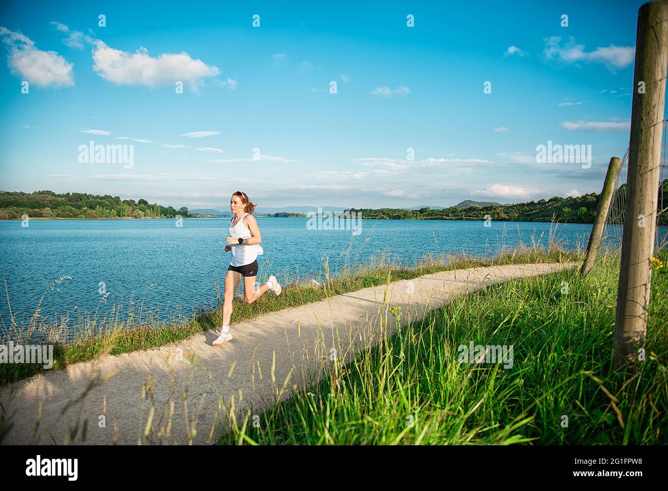 Girl running in nature, it is her healthy and free lifestyle Stock ...