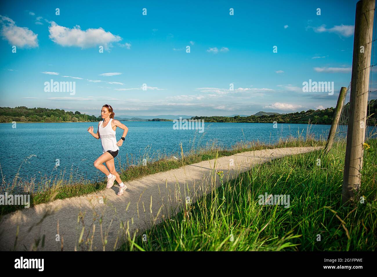 Girl running in nature, it is her healthy and free lifestyle Stock ...