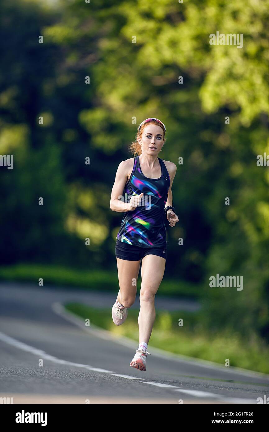 Girl running in nature, it is her healthy and free lifestyle Stock ...