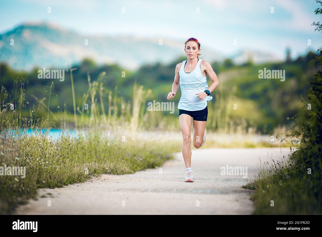 Girl running in nature, it is her healthy and free lifestyle Stock ...