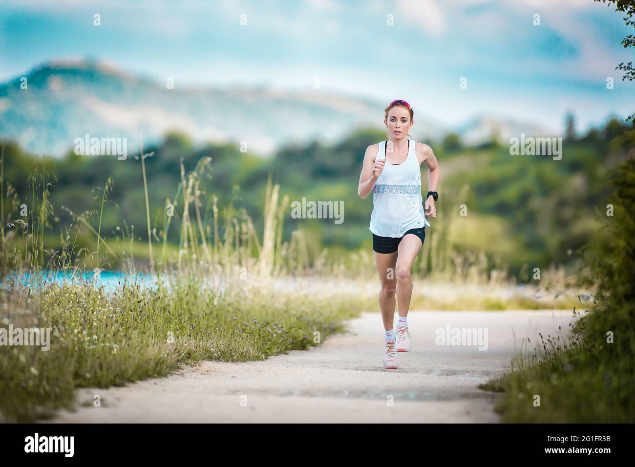 Girl running in nature, it is her healthy and free lifestyle Stock ...