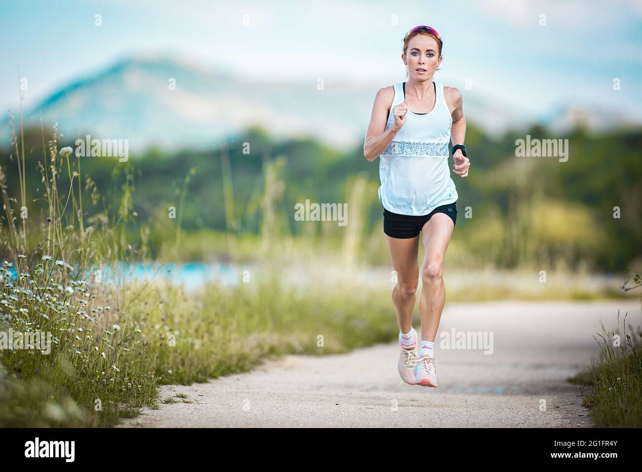 Girl running in nature, it is her healthy and free lifestyle Stock ...