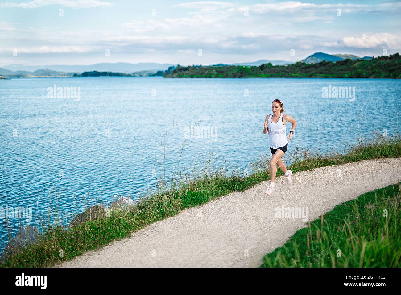 Girl running in nature, it is her healthy and free lifestyle Stock ...