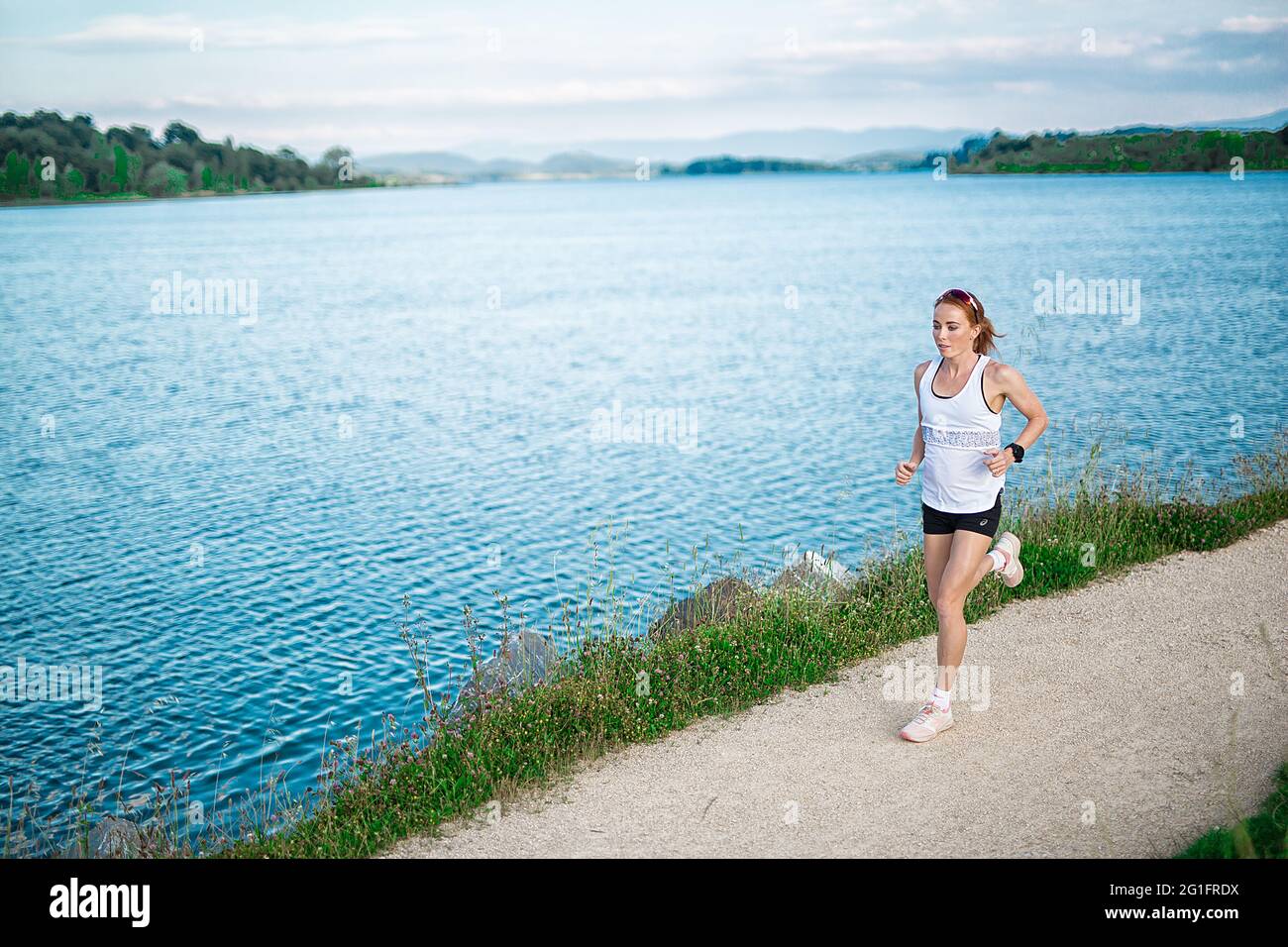 Girl running in nature, it is her healthy and free lifestyle Stock ...