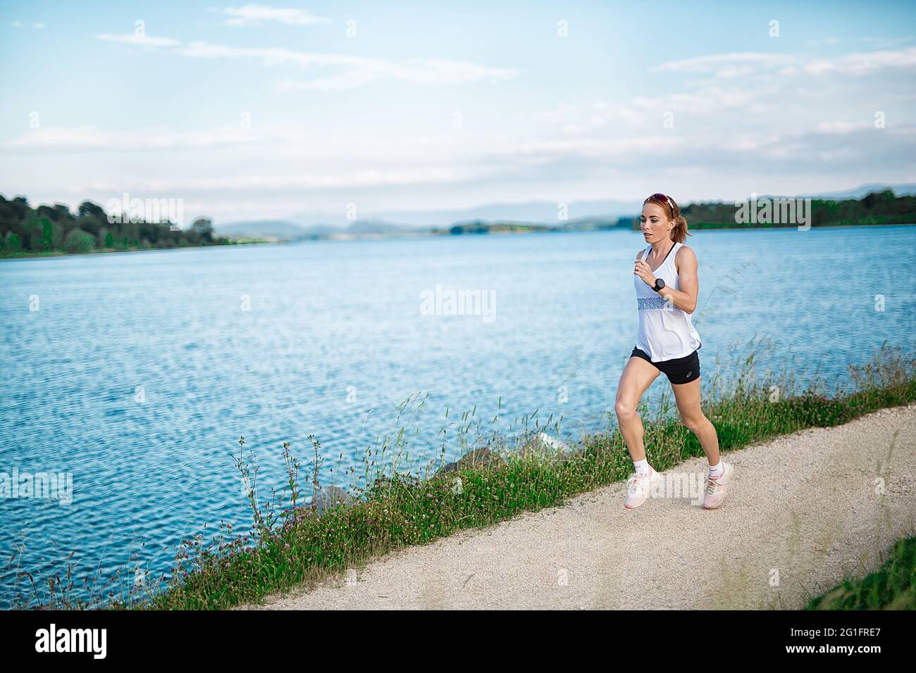 Girl running in nature, it is her healthy and free lifestyle Stock ...