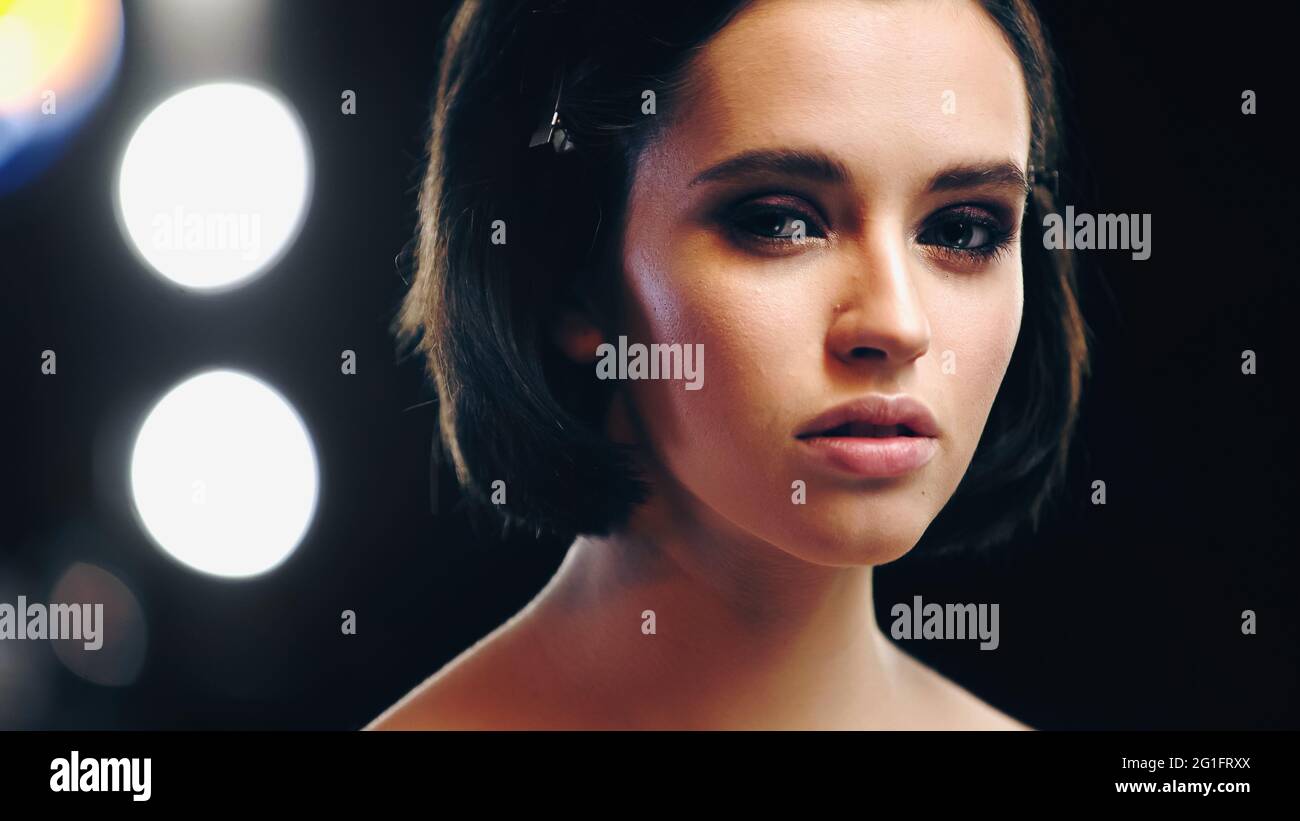 Model looking back at camera hi-res stock photography and images - Alamy