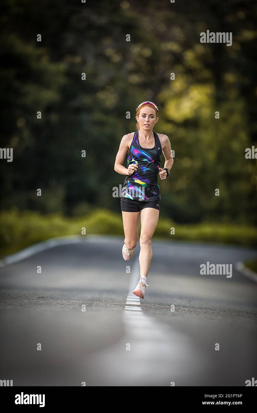 Girl running in nature, it is her healthy and free lifestyle Stock ...