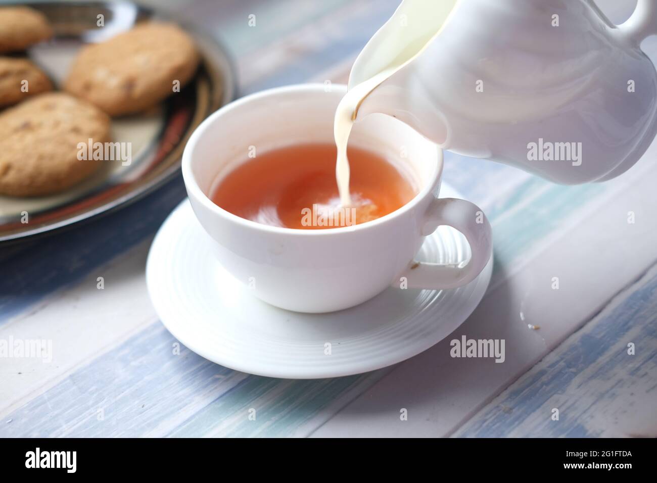 Teapot milk teacup and saucer hi-res stock photography and images - Alamy
