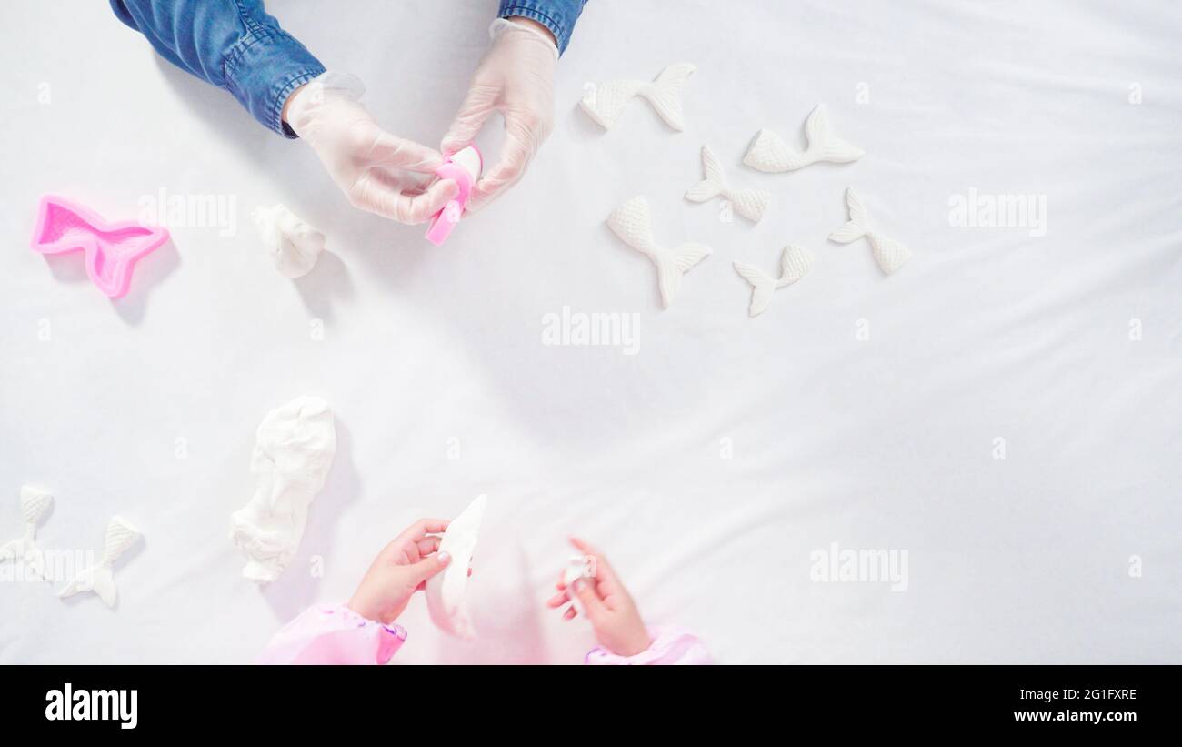 Flat lay. Step by step. Making mermaid tail from modeling clay in ...