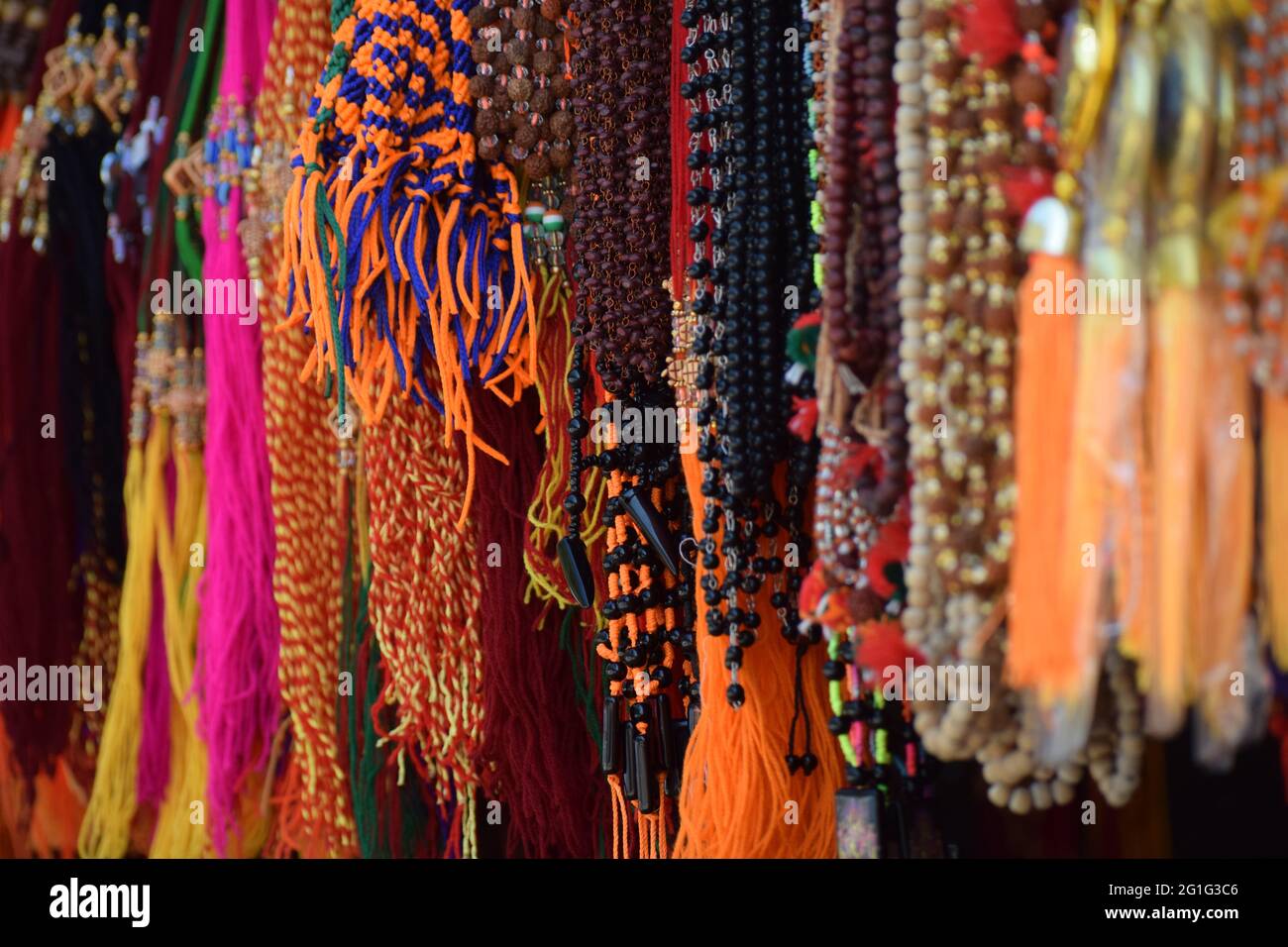 Closeup shot of woven colorful thread in the pooja thali for a ritual ...