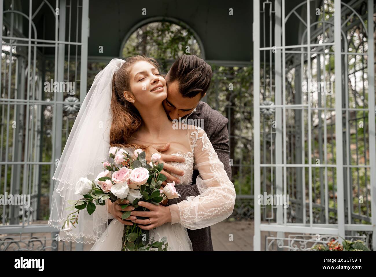 Woman kiss man neck hi-res stock photography and images - Alamy