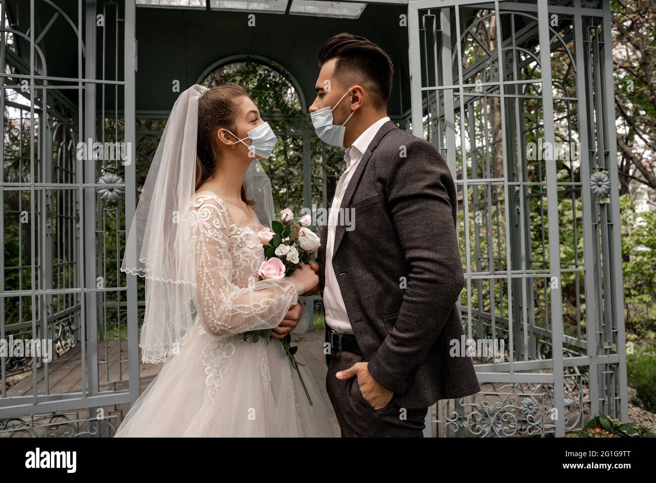 Wedding in masks hi-res stock photography and images - Alamy