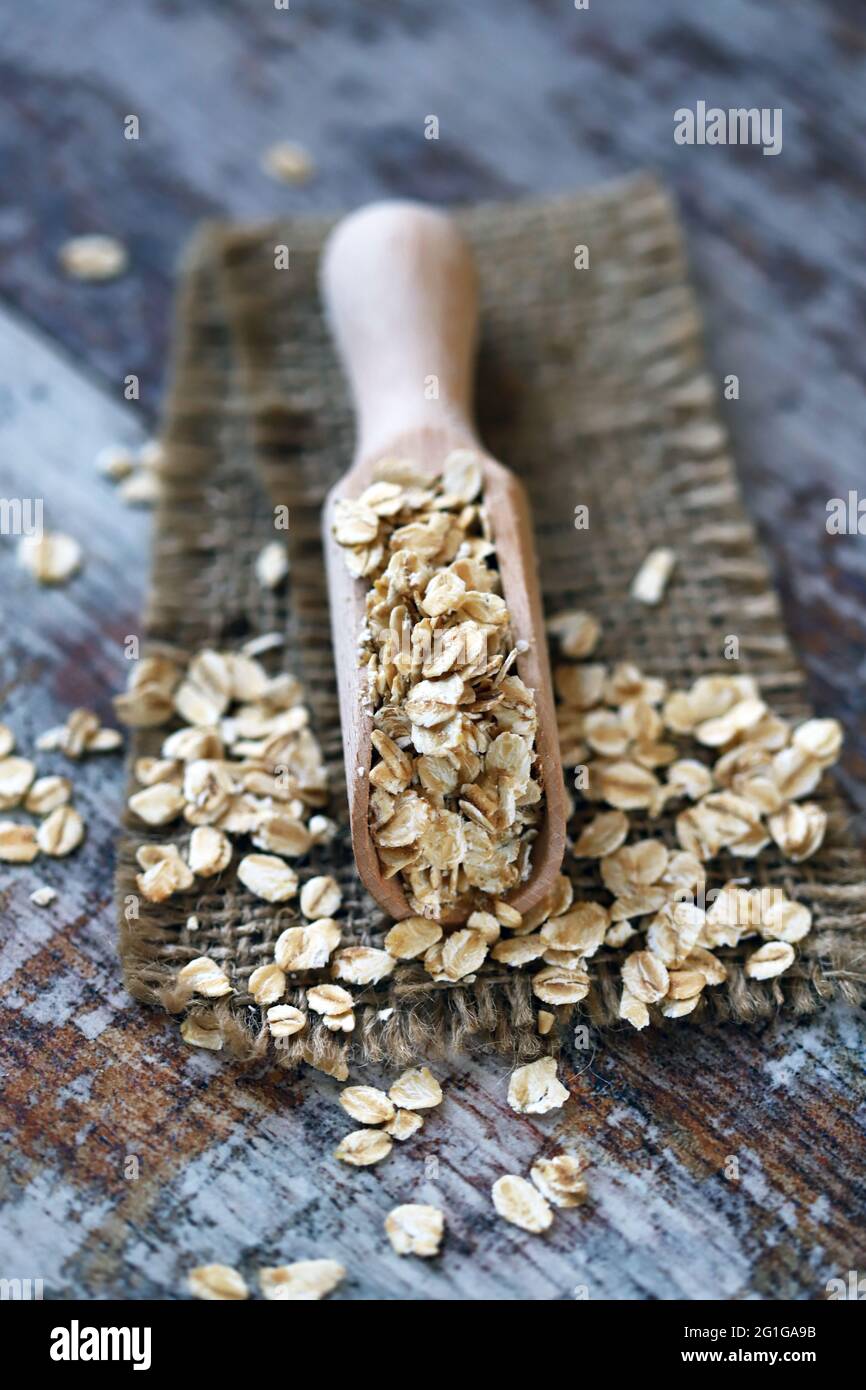 Oatmeal in a wooden spatula Stock Photo - Alamy