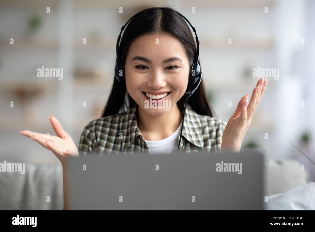 Asian woman video calling home hi-res stock photography and images - Alamy