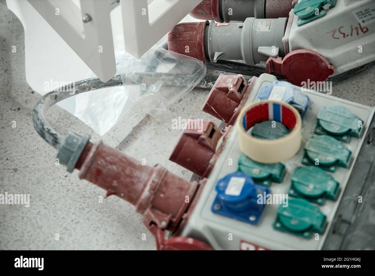 large electric equipment indoors on construction site Stock Photo - Alamy