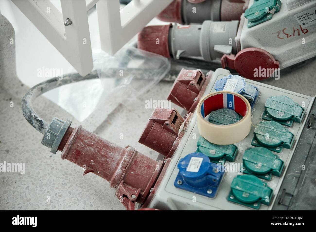 large electric equipment indoors on construction site Stock Photo - Alamy