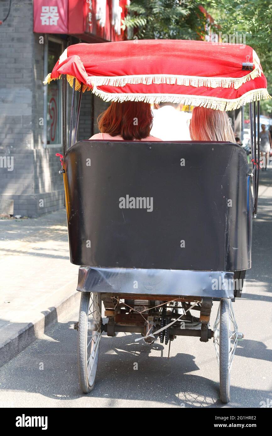 Pedal powered rickshaw hi-res stock photography and images - Alamy