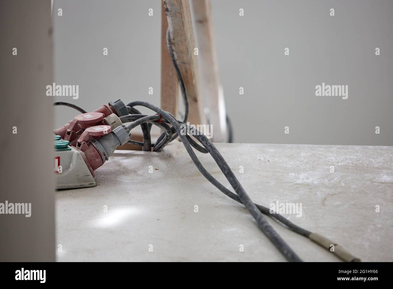 large electric equipment indoors on construction site Stock Photo - Alamy