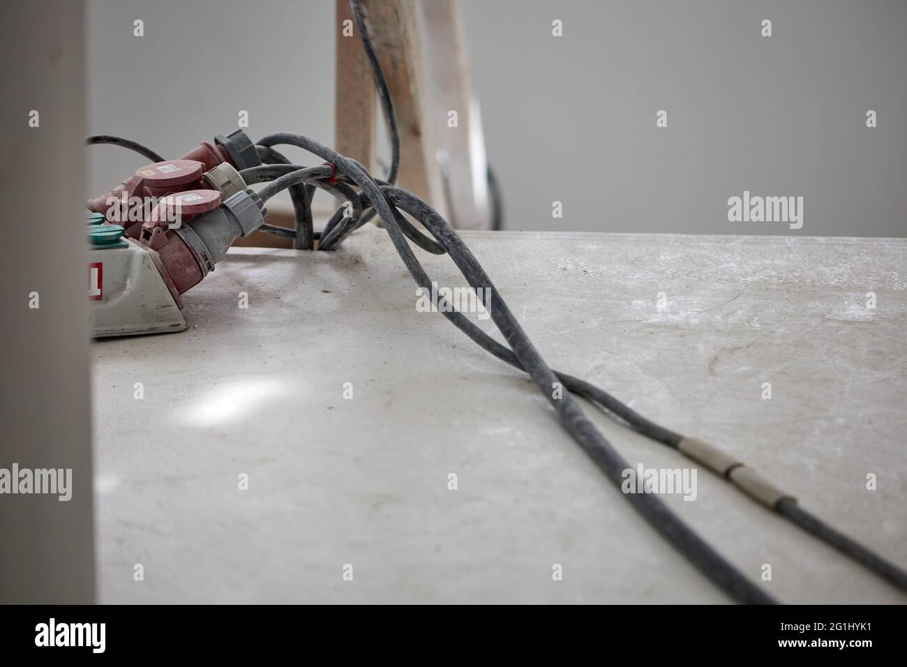 large electric equipment indoors on construction site Stock Photo - Alamy