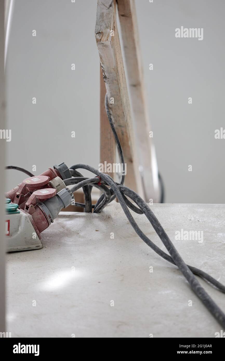 large electric equipment indoors on construction site Stock Photo - Alamy