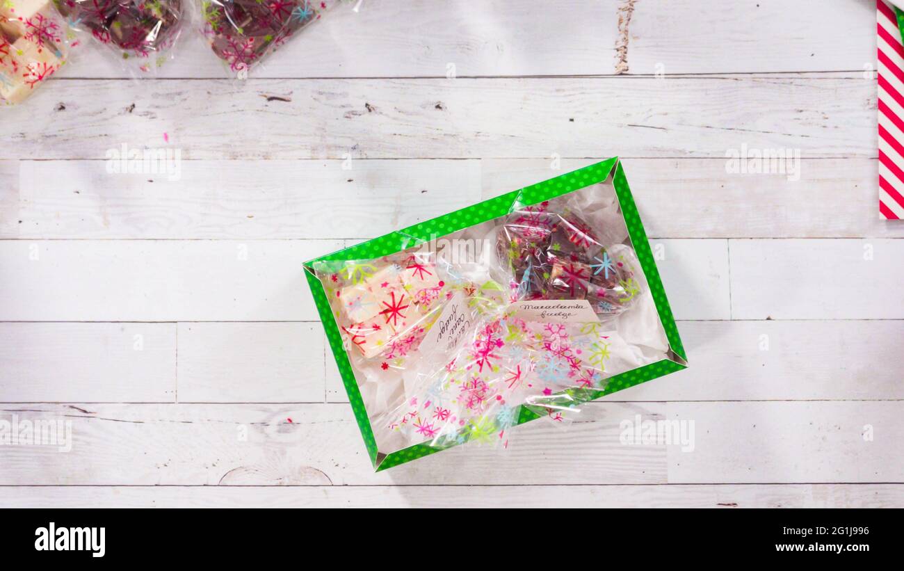 Flat lay. Step by step. Packaging homemade fudge and cookies into a ...