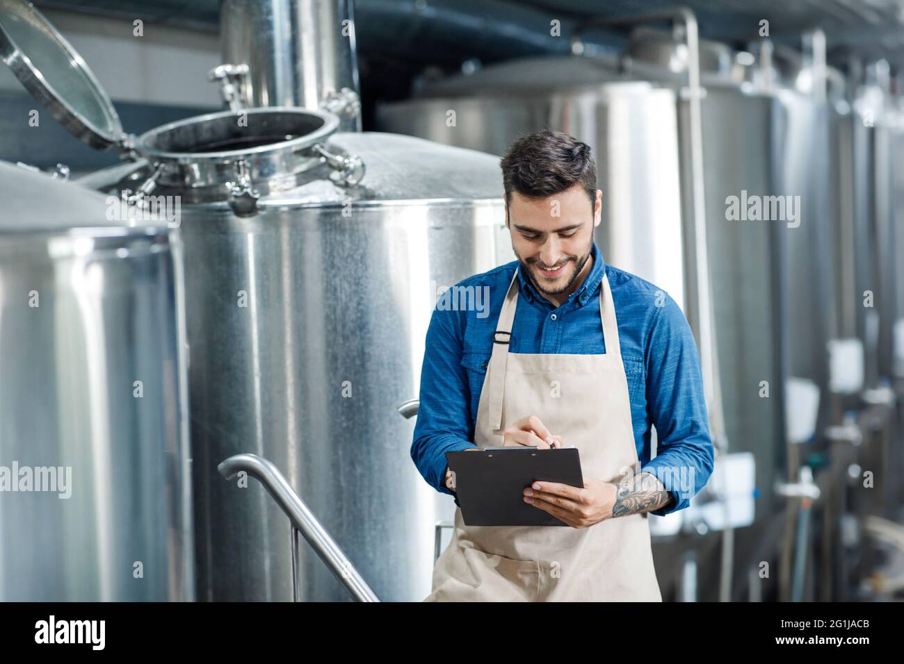 Work in modern brewery, data collection and production monitoring Stock ...