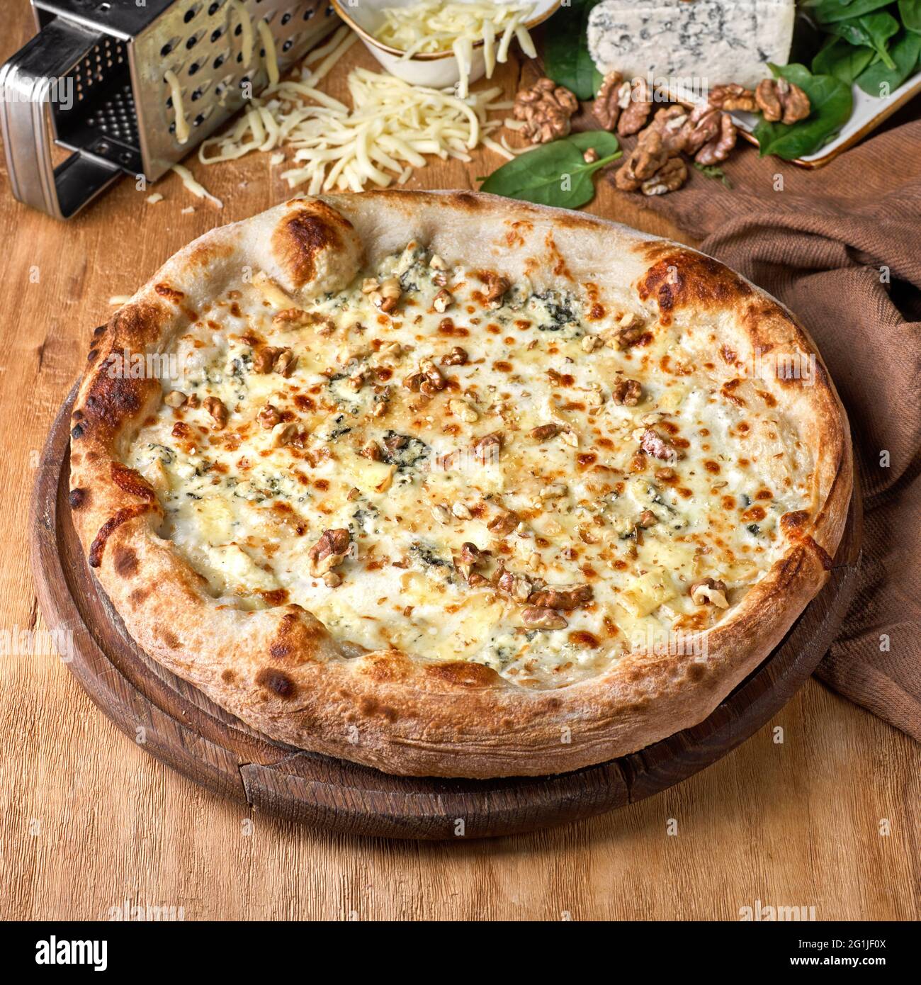 Four Cheese Pizza or Quattro Formaggi Pizza topped with mozzarella ...