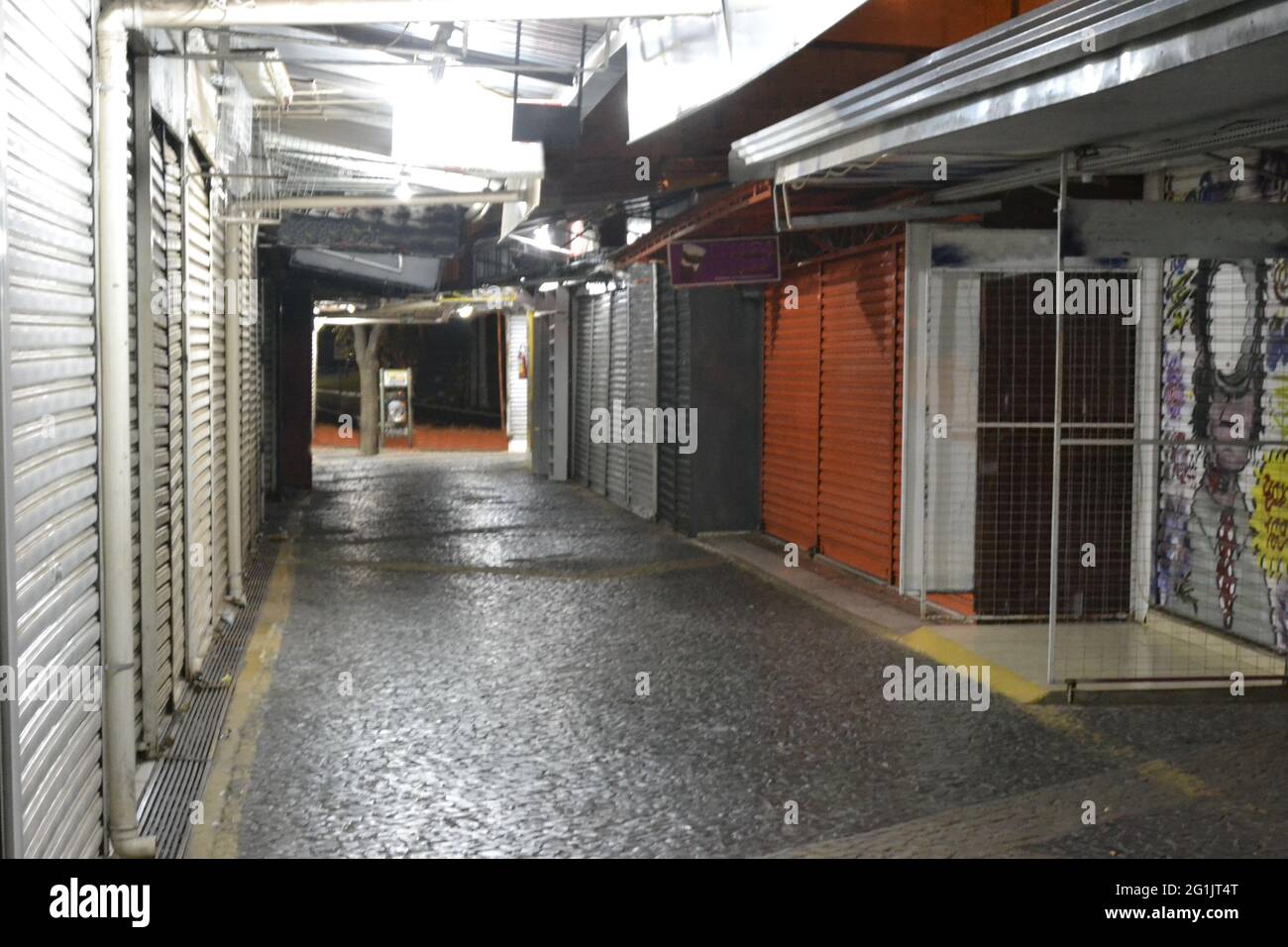 Black market shopping mall. Popular shopping shops closed at night in ...