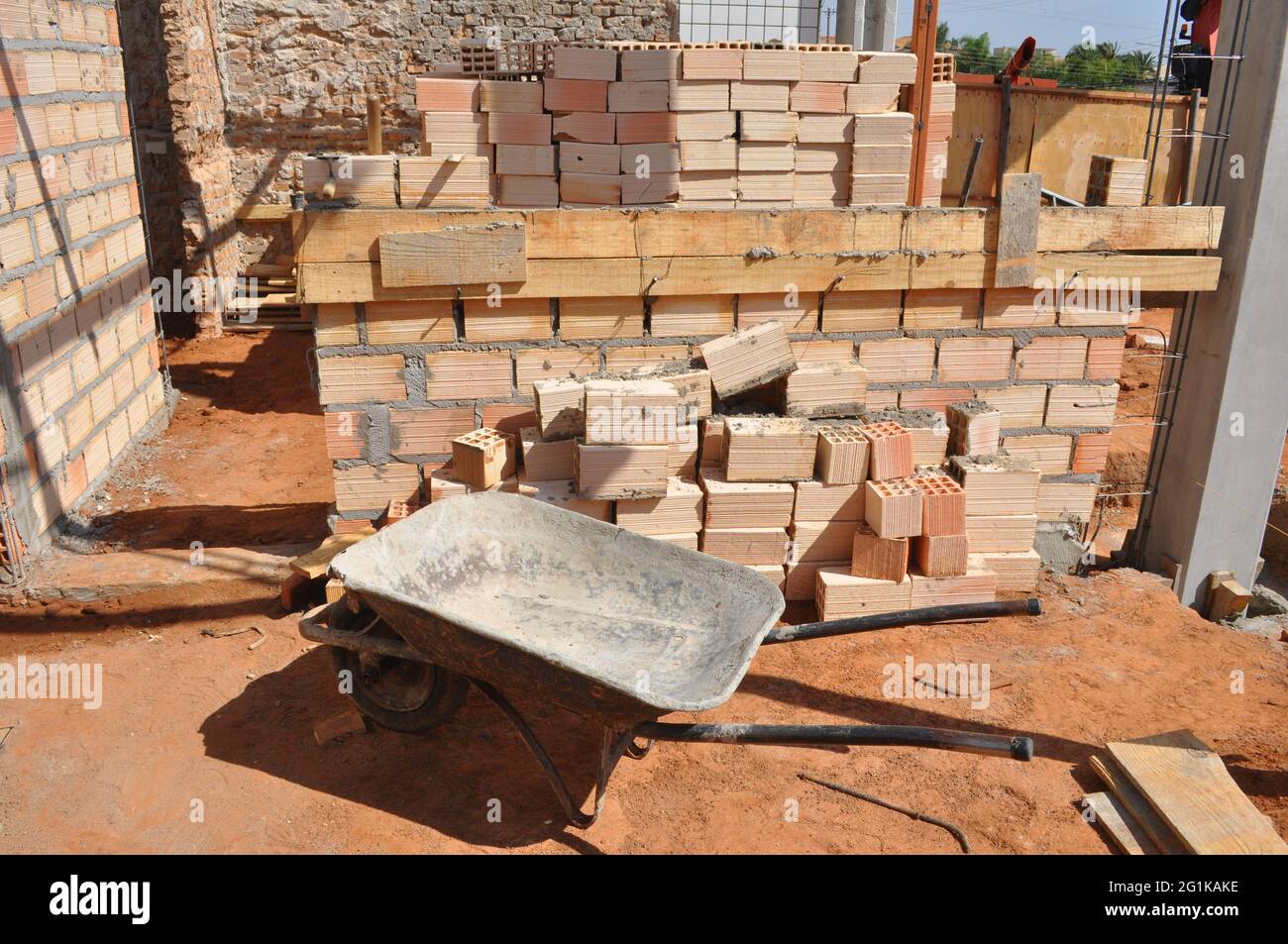 Wheelbarrow or trolley. Wheelbarrow used in construction site to load ...