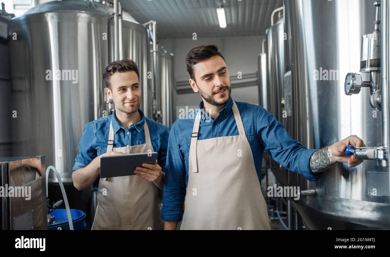 Smart modern craft brewery. Beer production process and brewing at ...