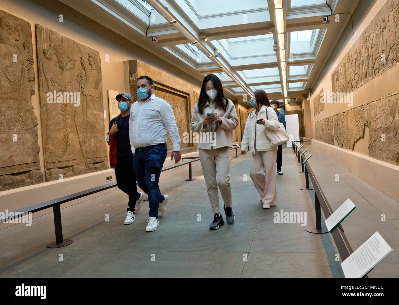 Visitors to the British Museum in London,wearing masks due to COVID-19 ...
