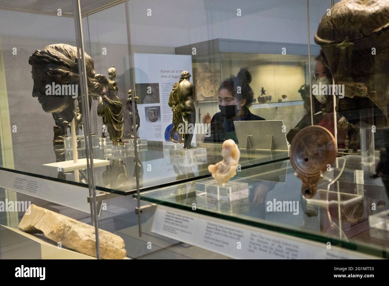 Visitors to the British Museum in London,wearing masks due to COVID-19 ...