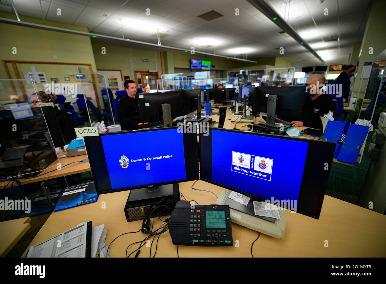 Members of police staff operate the 999 emergency phone lines in the ...