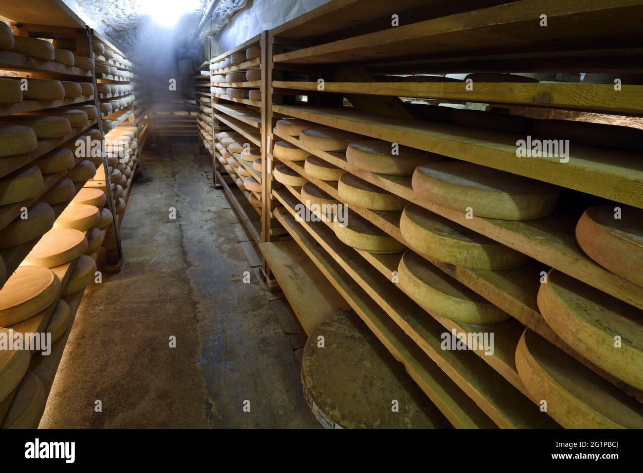 Cheese wheels comte hi-res stock photography and images - Alamy