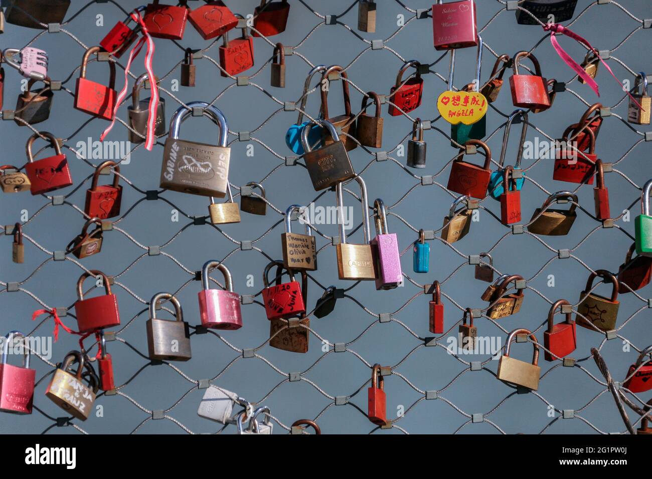 Love Locks - a padlock attached to a bridge by a couple as a symbol of ...