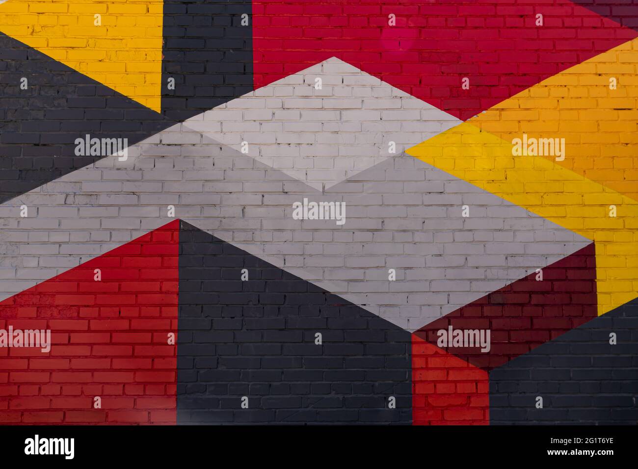 Colorful grey, red, yellow brick wall as background, texture Stock ...