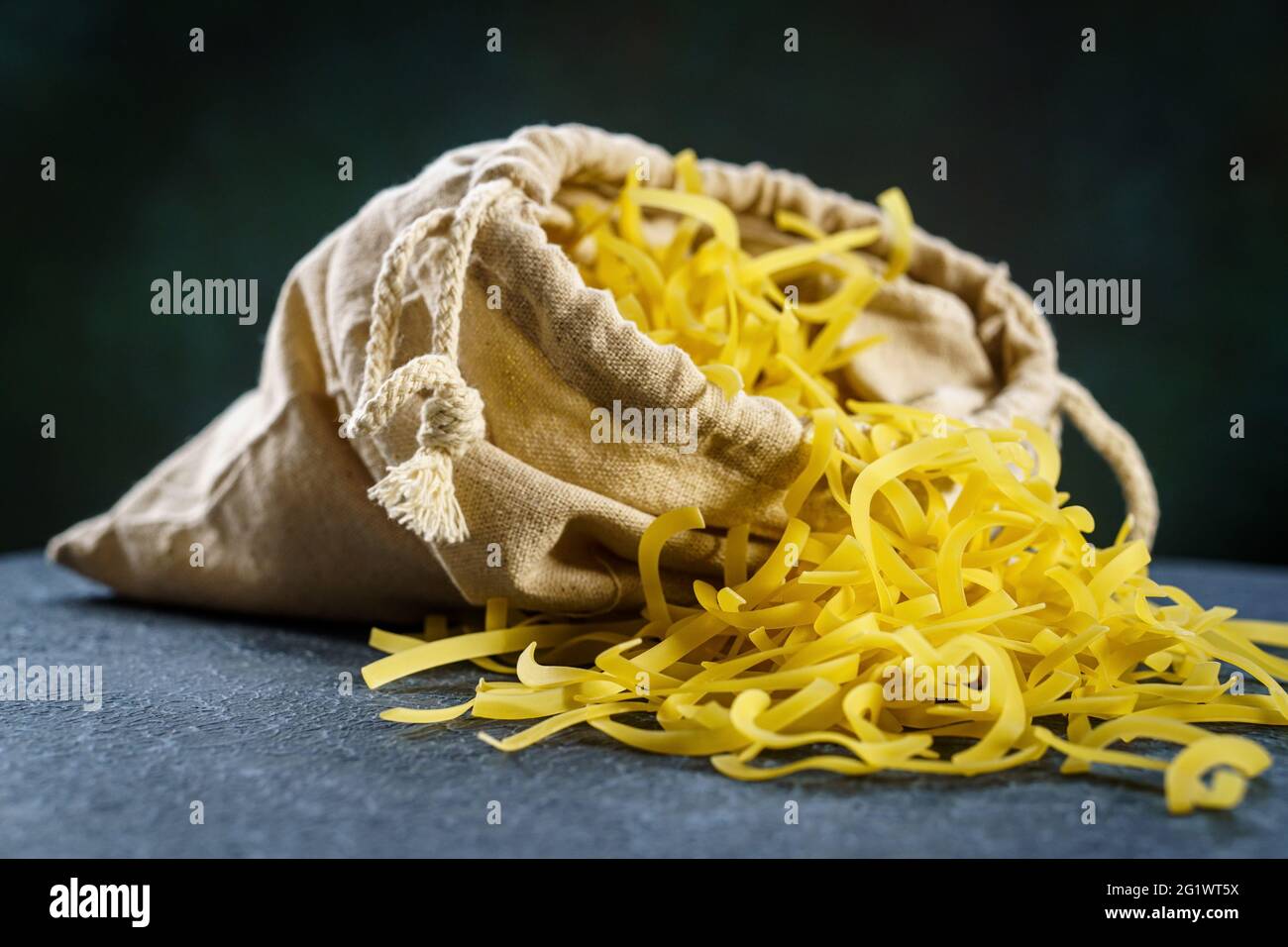 Homemade dry pasta in bag close-up, selective focus Stock Photo - Alamy